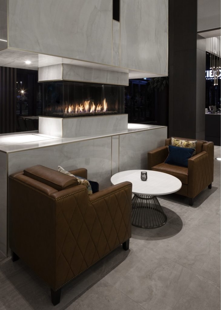 Attract Hotel Guests with Features Like In-Room Modern Fireplaces