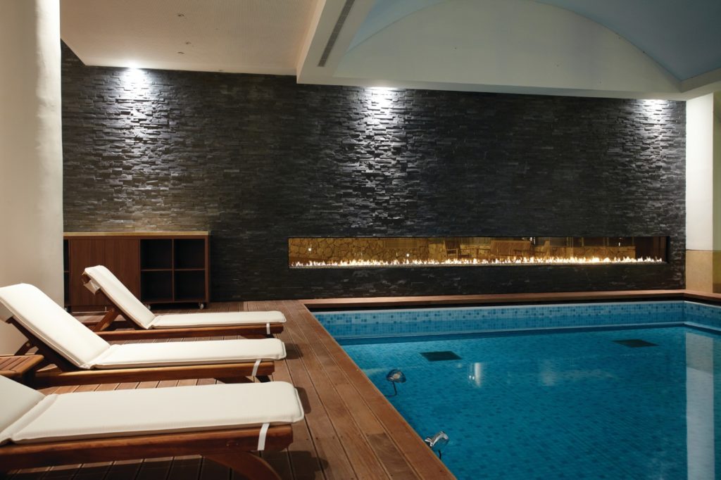 Get the Best of Both Worlds with an Indoor/Outdoor Fireplace